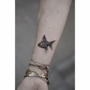 Under The Sea: Unique Fish Tattoo Designs For Ocean Lovers