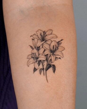 10 Beautiful And Amazing Fine-line Lily Flower Tattoo Designs