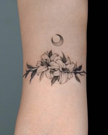 10 Beautiful And Amazing Fine-line Lily Flower Tattoo Designs