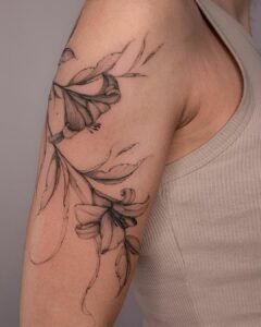 10 Beautiful And Amazing Fine-line Lily Flower Tattoo Designs